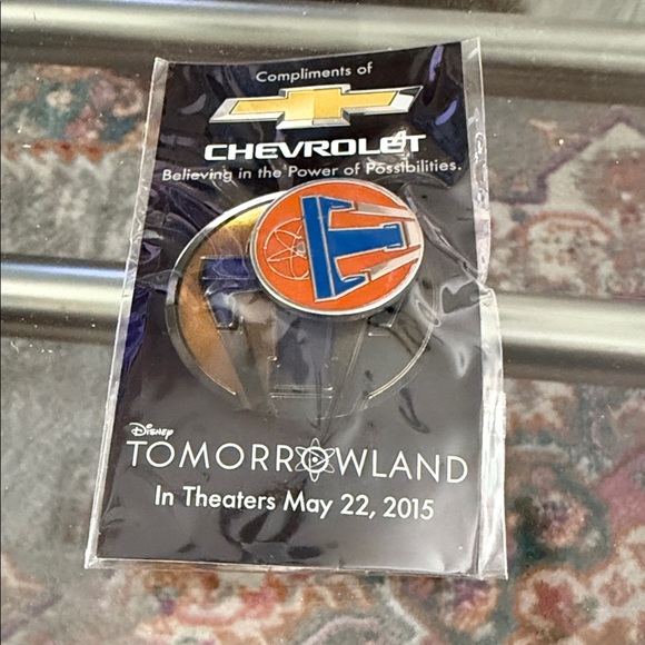 Disney | Other | Disney Tomorrowland Pin With Orange And Blue Design ...